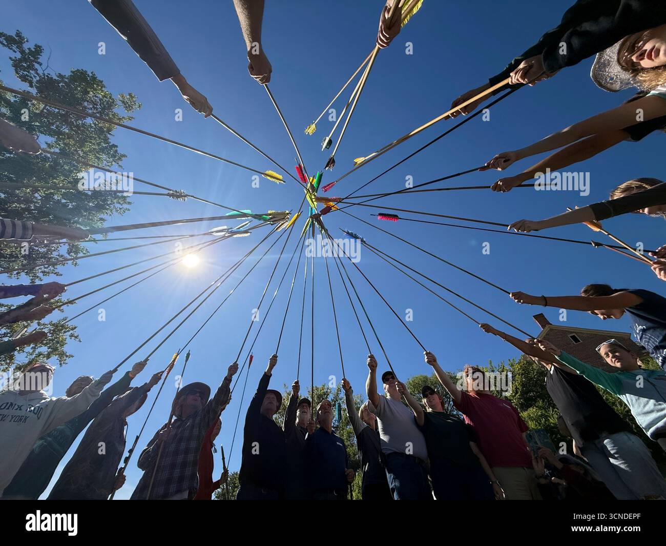 Competitors raise their darts as part of the opening ceremony for the ...