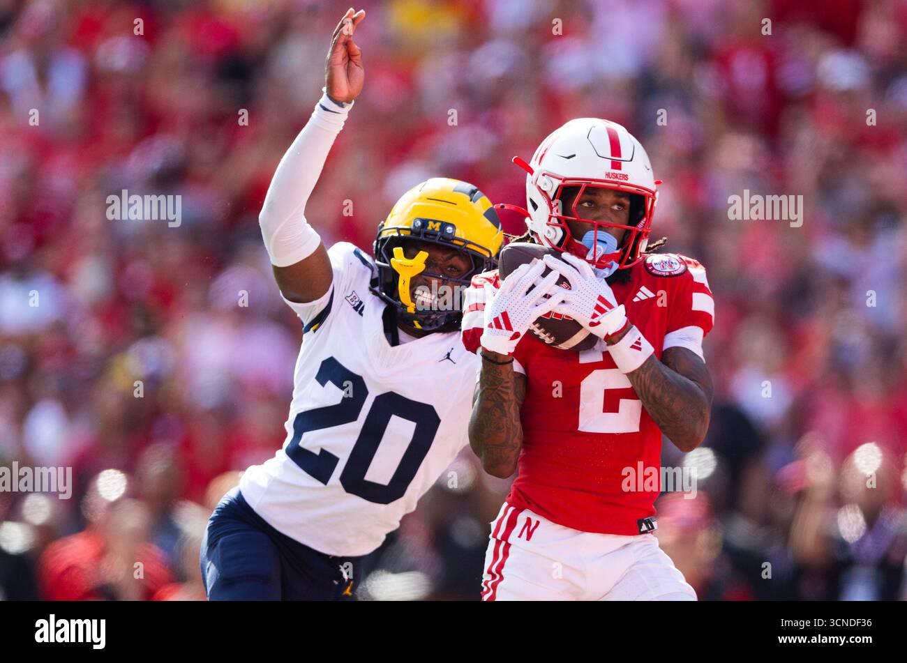 Nebraska's Jacory Barney Jr. (2) catches a touchdown pass ahead of ...