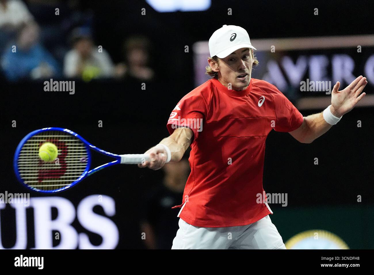 Team World's Alex de Minaur, of Australia, returns a shot against Team ...