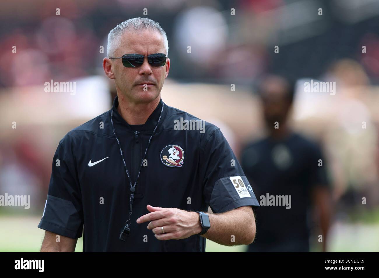 Florida State head coach Mike Norvell walks the field before an NCAA ...
