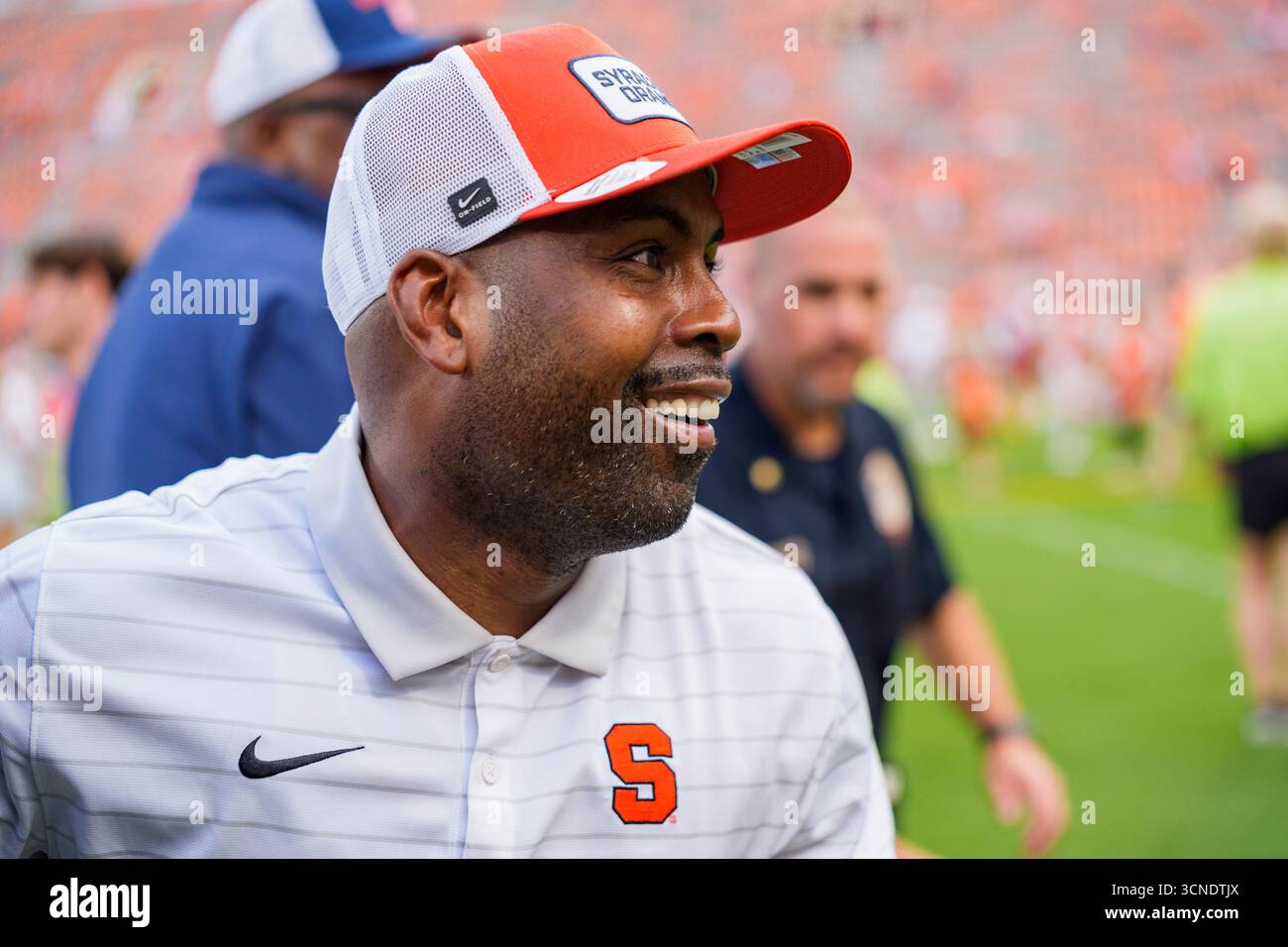 Syracuse head coach Fran Brown heads off the field after defeating ...