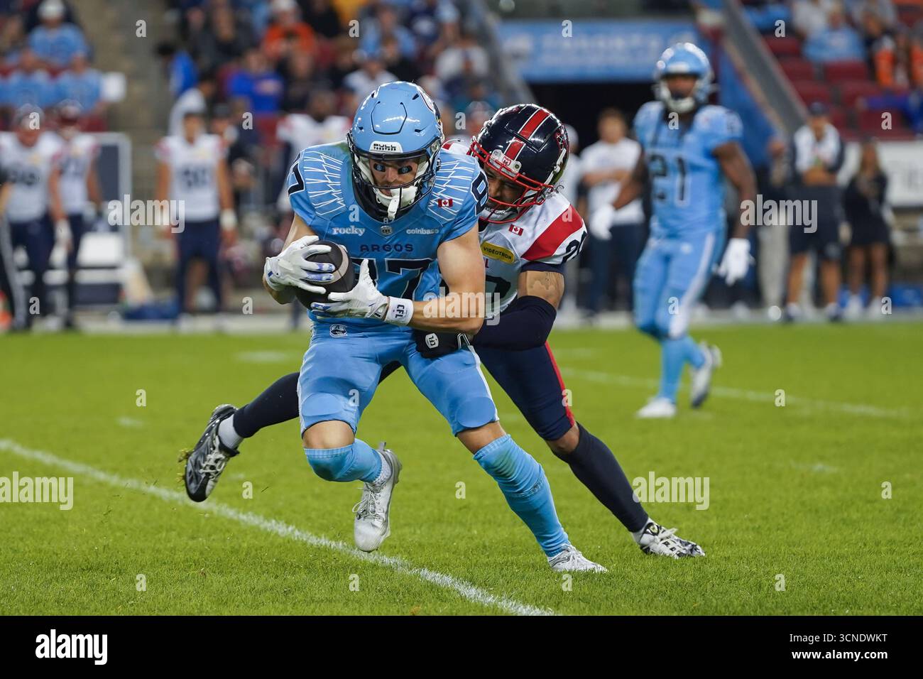 wide receiver Jake Herslow #87 of Toronto Argonauts catches the ball in ...