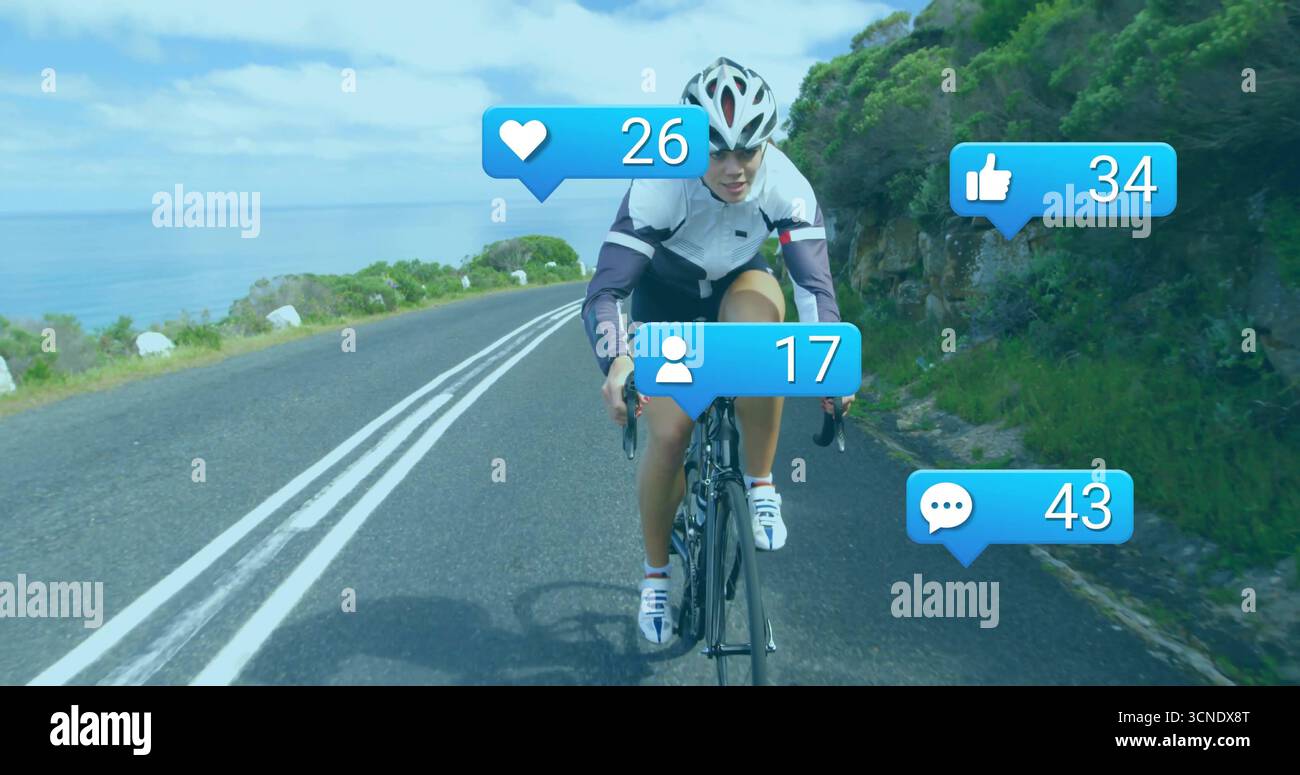 Cycling woman wearing jersey and helmet riding road bike on coastal ...