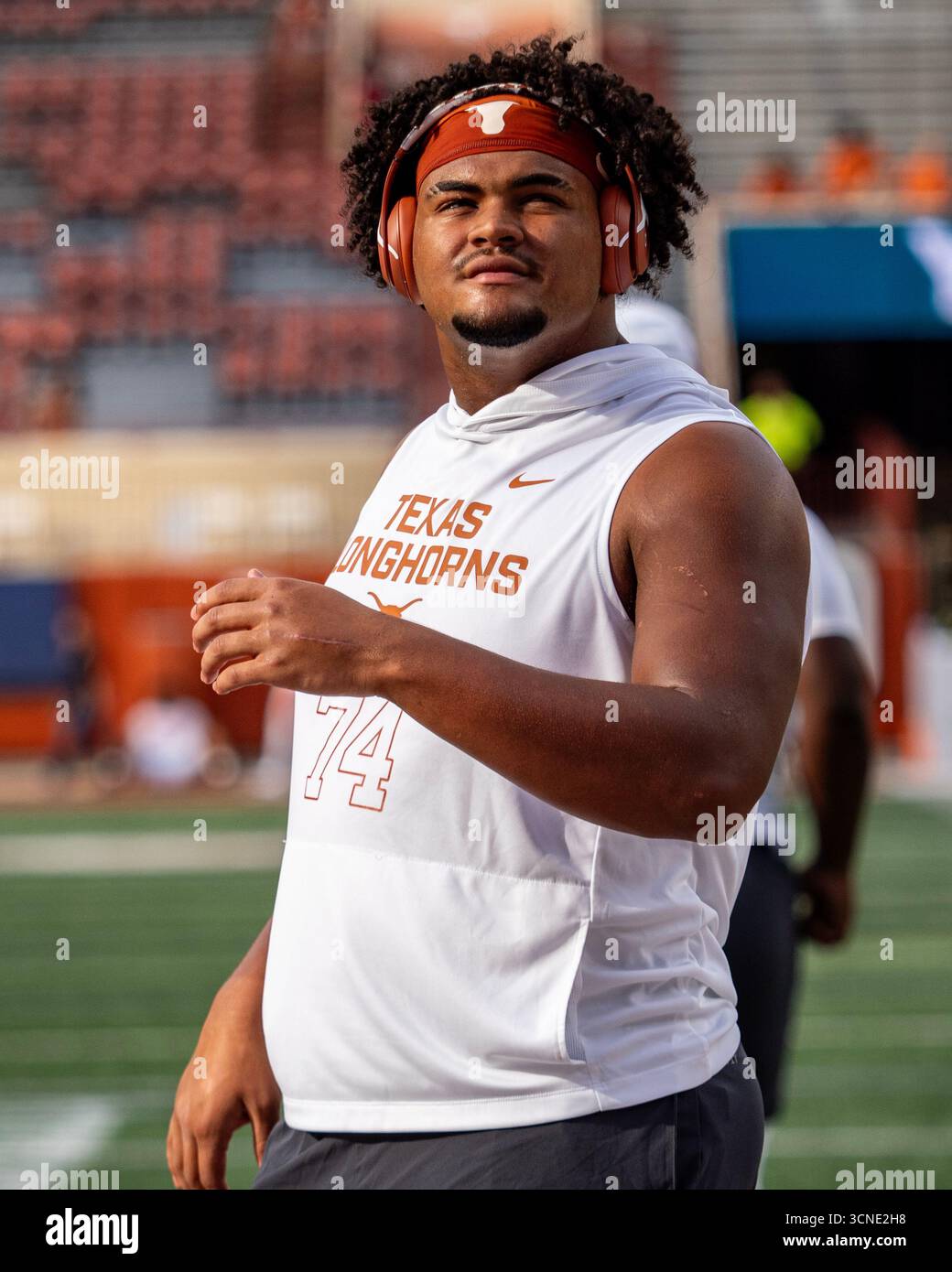Sept 20, 2025. Trevor Goosby (74) of the Texas Longhorns warms up ...