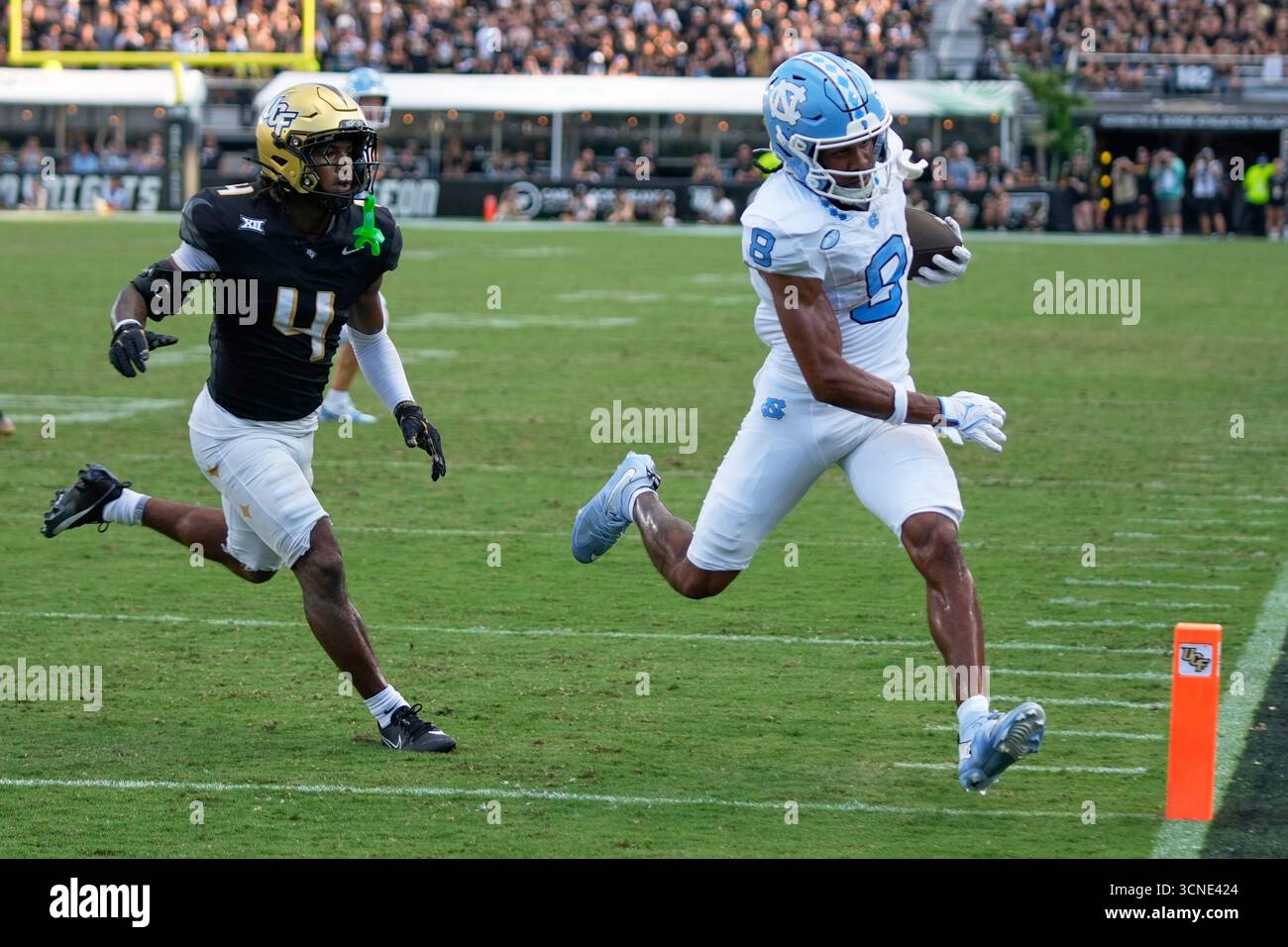 North Carolina wide receiver Kobe Paysour (8) scores a touchdown as he ...