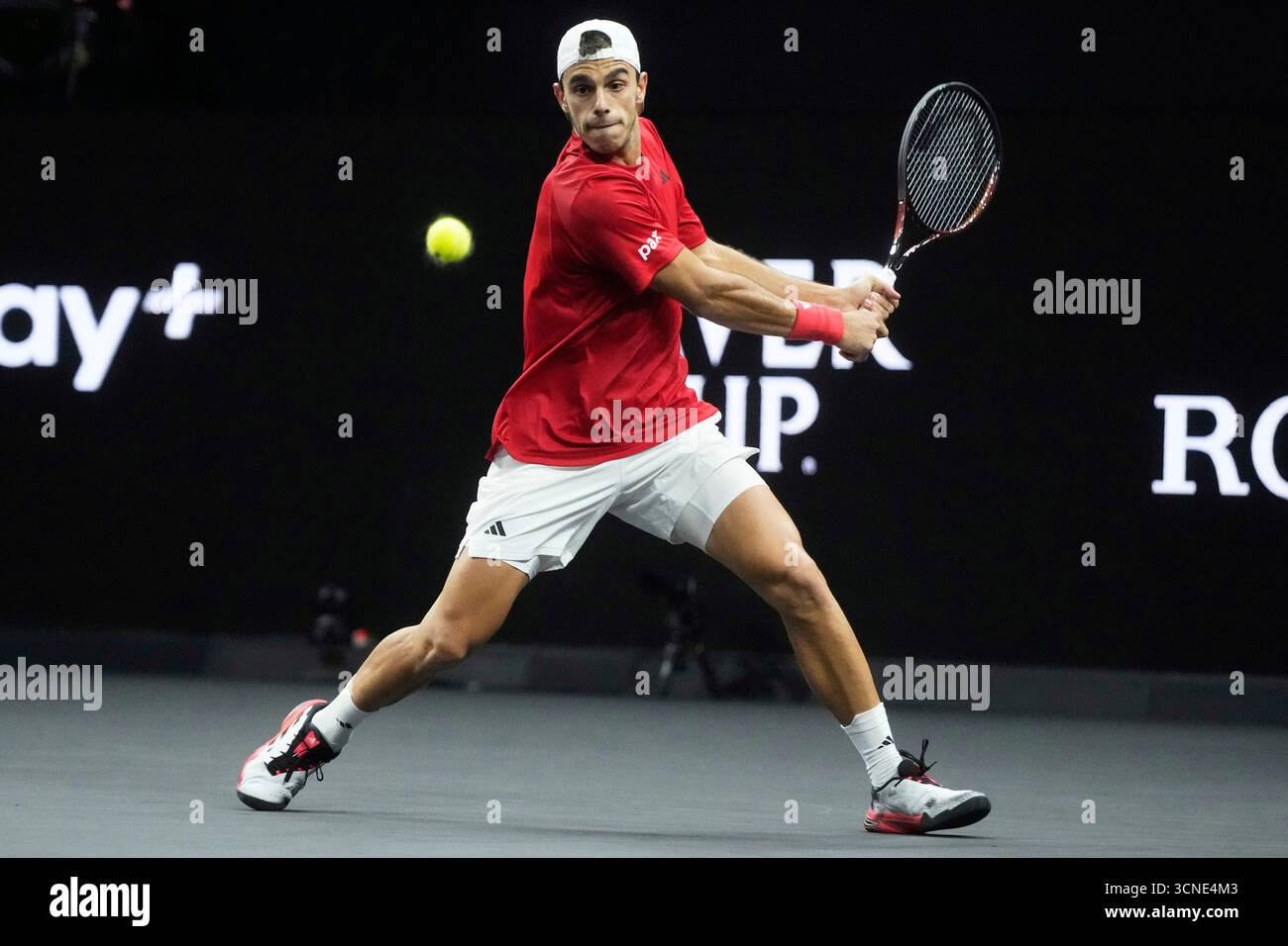 Team World's Francisco Cerundolo, of Argentina, returns a shot against ...