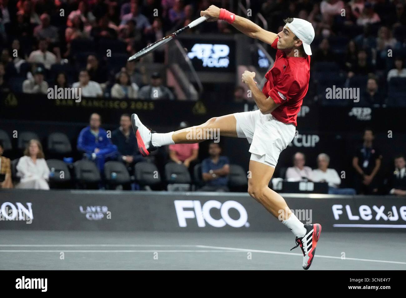 Team World's Francisco Cerundolo, of Argentina, returns a shot against ...