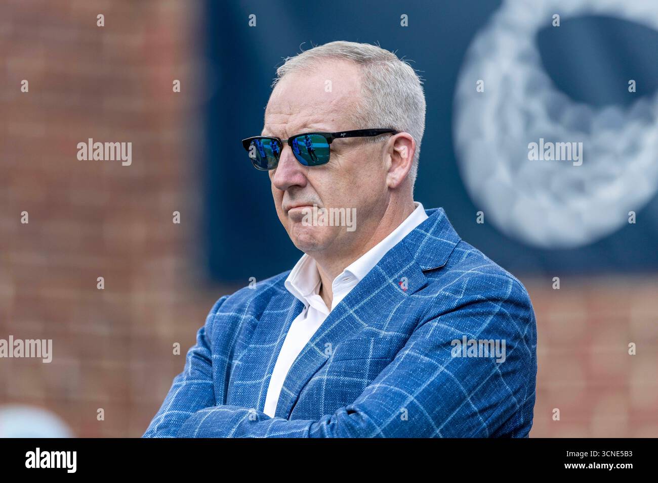 Southeastern Conference commissioner Greg Sankey visits the field for ...