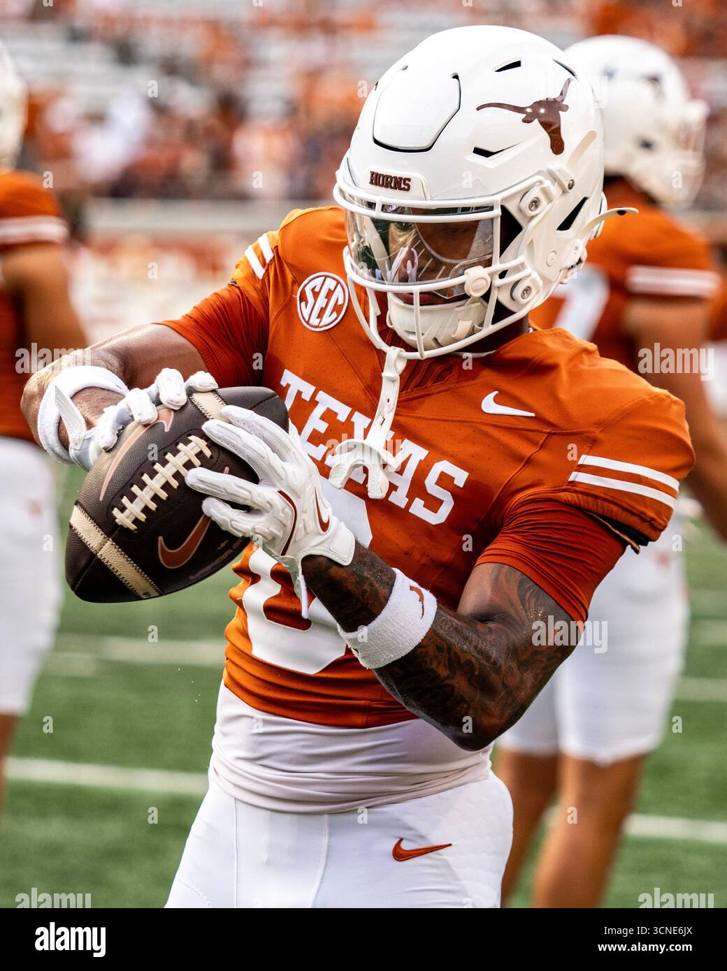 Sept 20, 2025. DeAndre Moore Jr (0) of the Texas Longhorns warms up ...