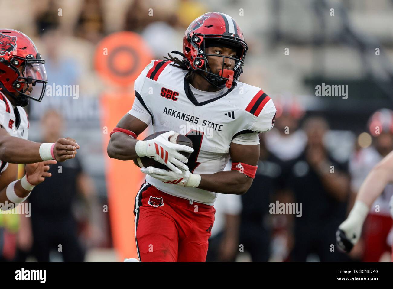 Arkansas State running back Devin Spencer (4) runs with the ball during ...