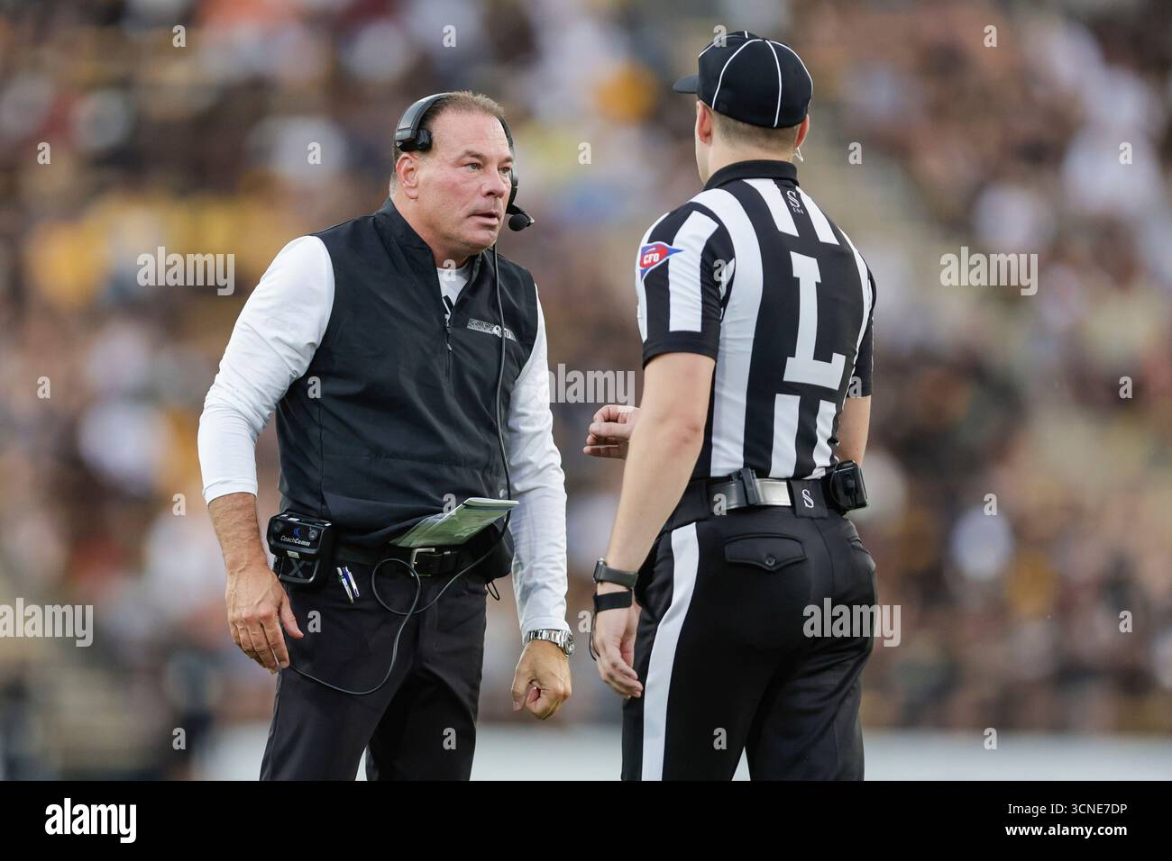 Arkansas State head coach Butch Jones talks with an official during the ...