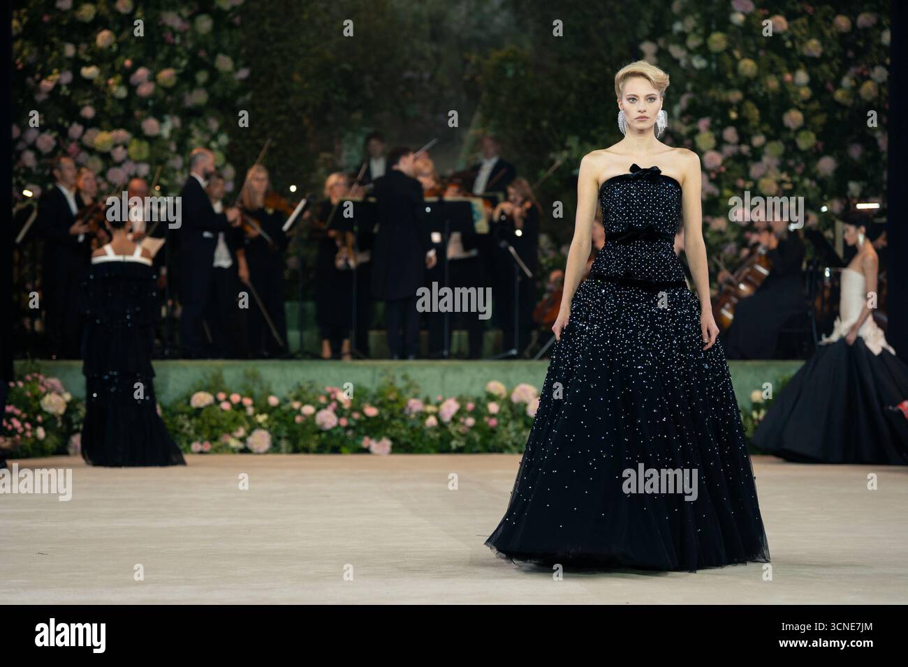 Model walks the runway at the Richard Quinn show during London Fashion ...