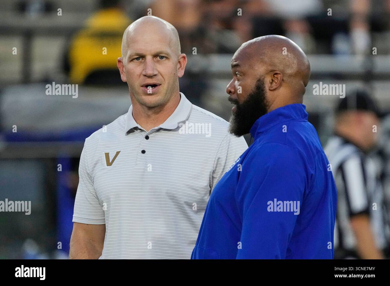 Vanderbilt head coach Clark Lea, left, speaks with Georgia State head ...