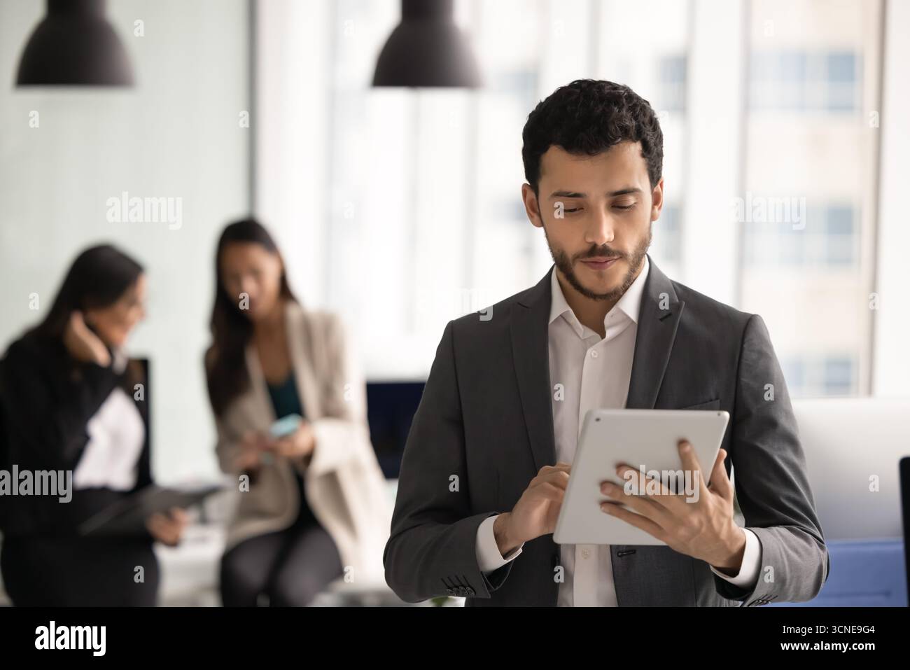 Portrait middle eastern employee typing hi-res stock photography and ...