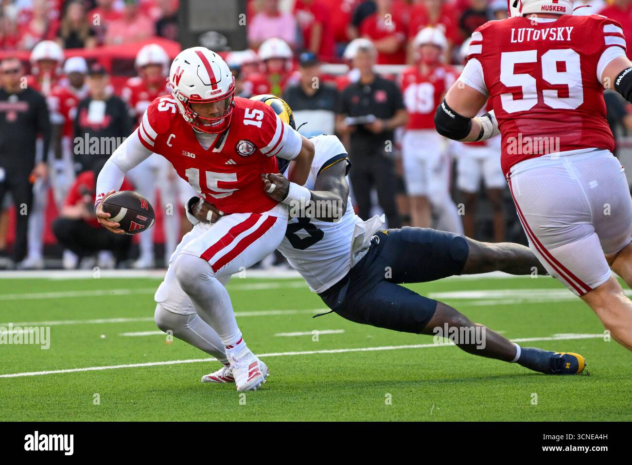 September 20, 2025: Nebraska quarterback Dylan Raiola (15) is sacked by the Michigan defense ...