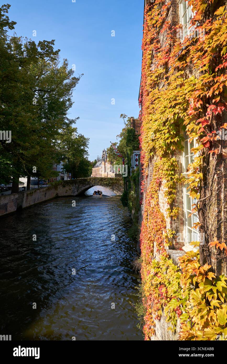 Autumn Colors from Peerdenstraat Bridge Bruges vertical. Scenic tourist ...
