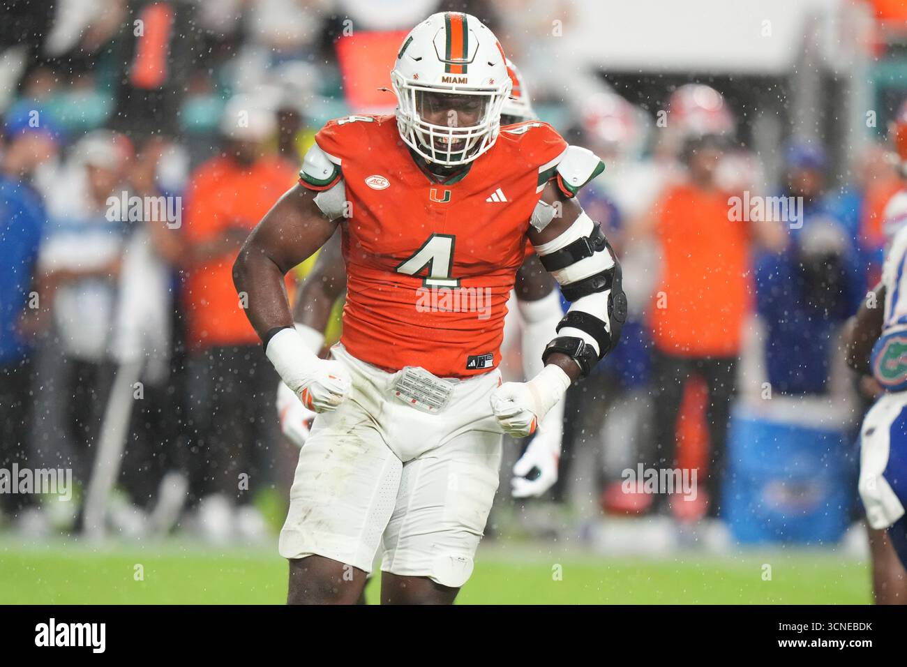 Miami defensive lineman Rueben Bain Jr. (4) reacts after a play during ...