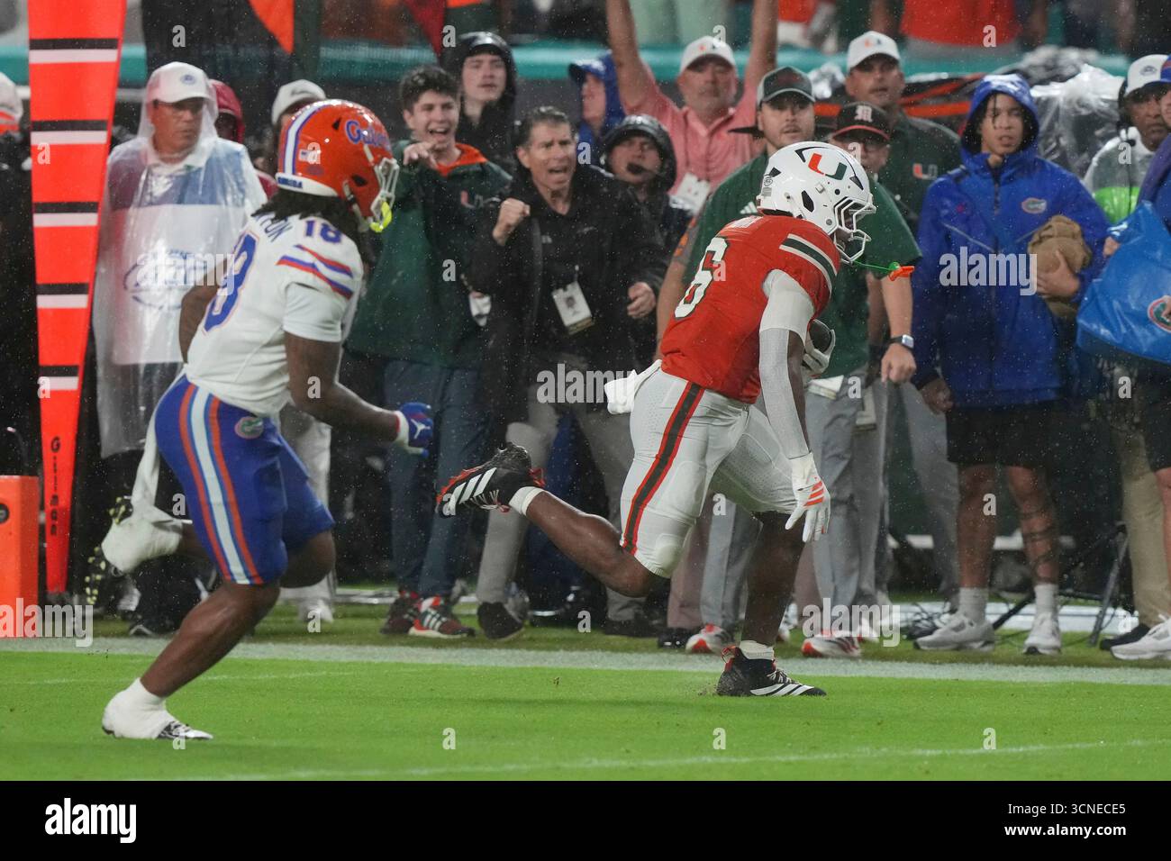 Miami running back CharMar Brown (6) runs with the ball during the ...