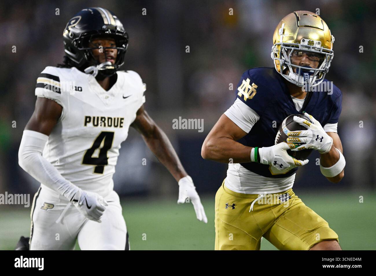 Notre Dame wide receiver Jordan Faison (6) catches a touchdown pass ...