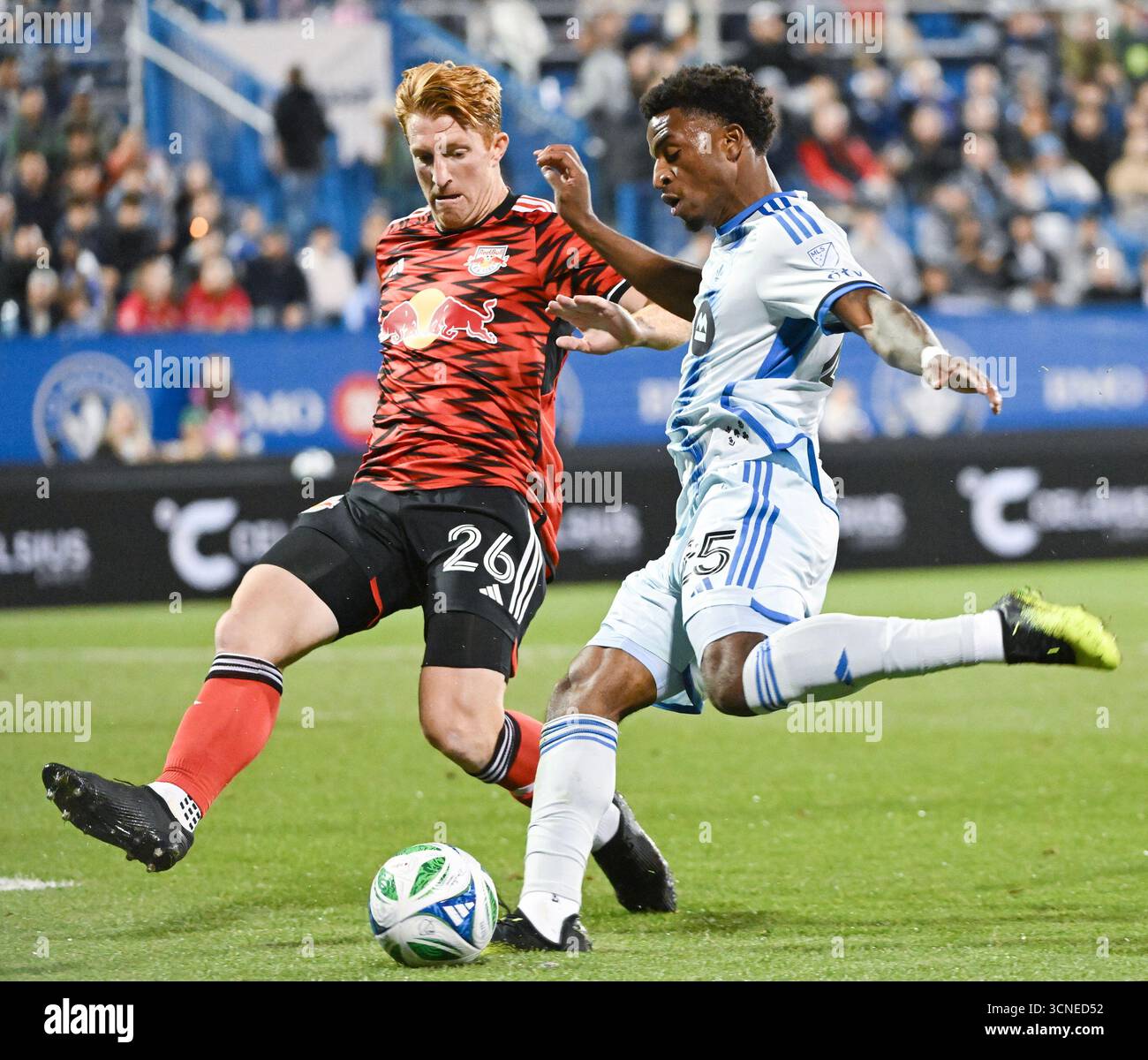 New York Red Bulls' Tim Parker (26) defends against CF Montreal's Dante ...