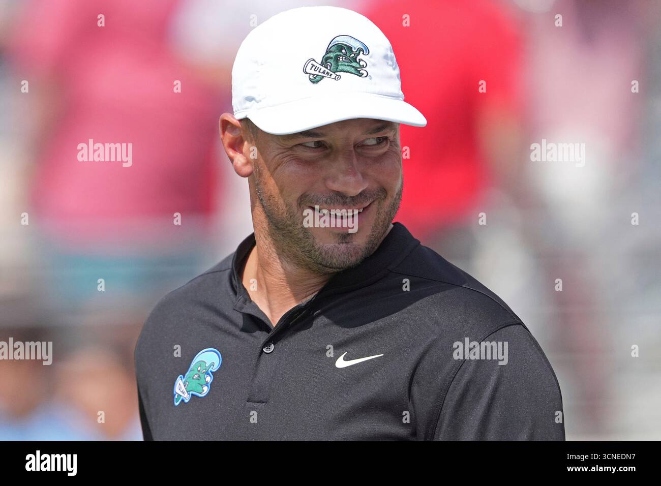 Tulane head coach Jon Sumrall smiles towards his team prior to the ...