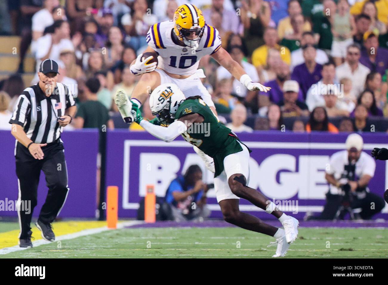 LSU tight end Bauer Sharp (10) tries to hurdle over Southeastern ...