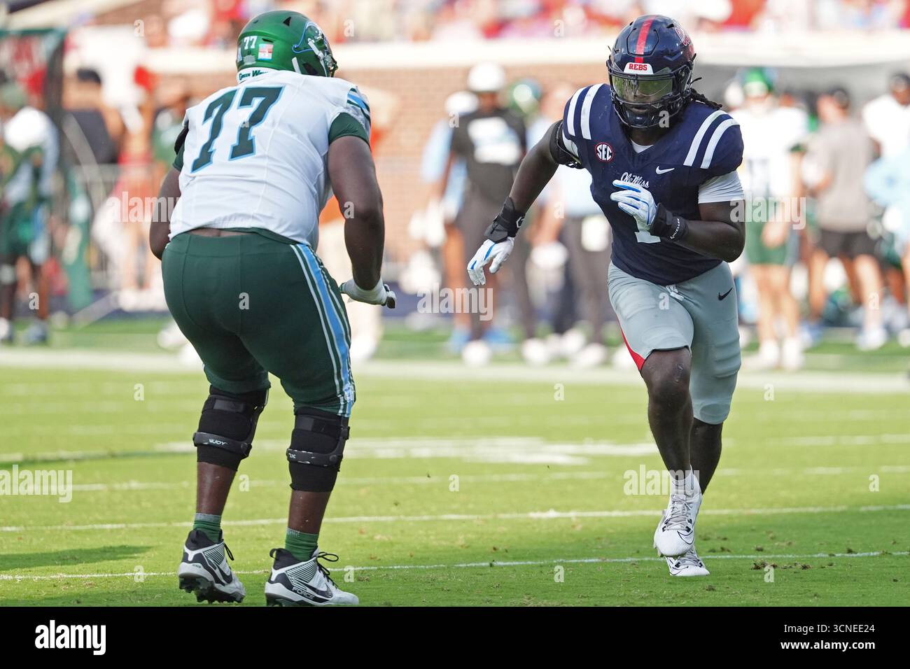Mississippi defensive end Princewill Umanmielen (1) attempts to get ...