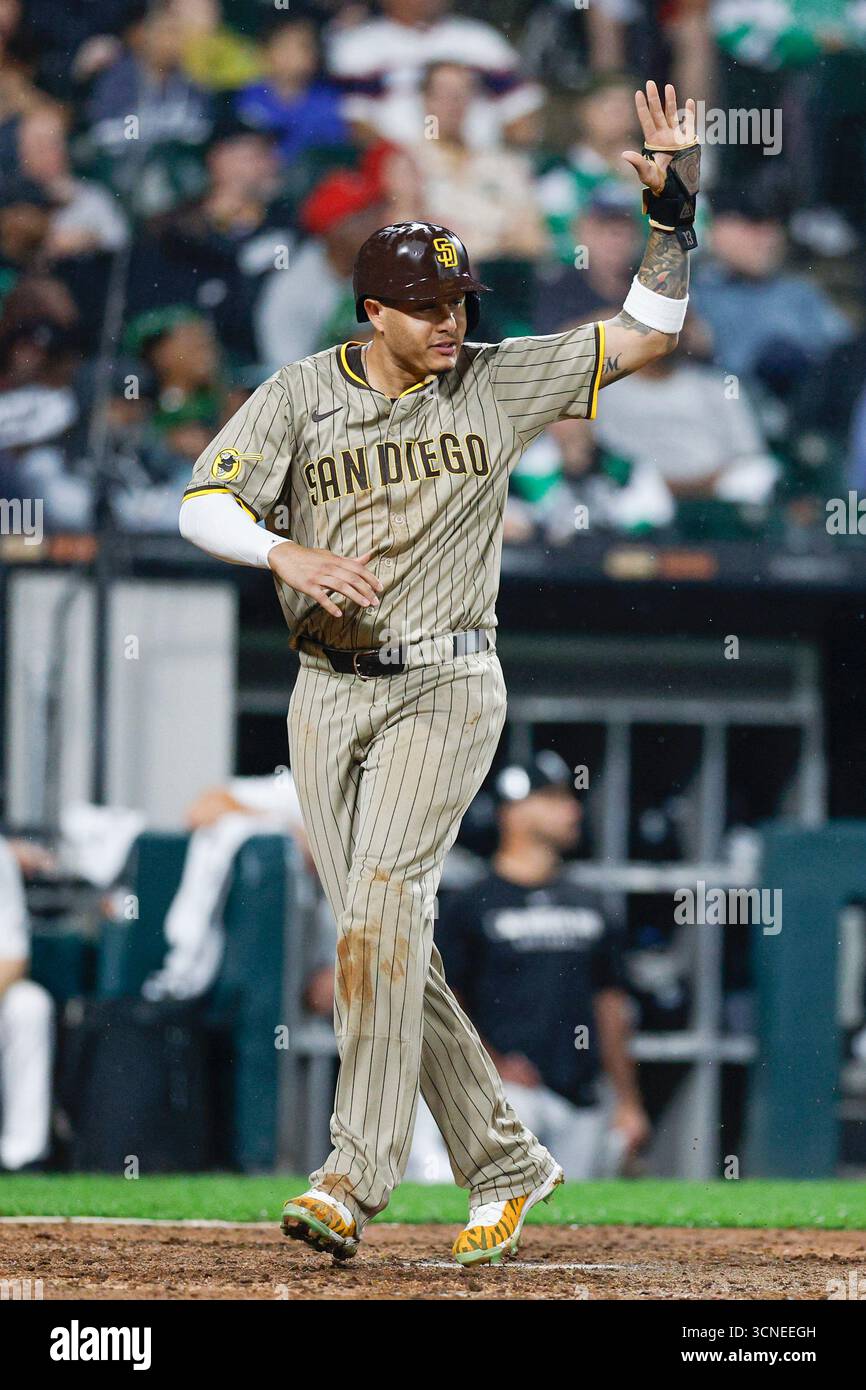 San Diego Padres' Manny Machado scores on a double hit by San Diego ...