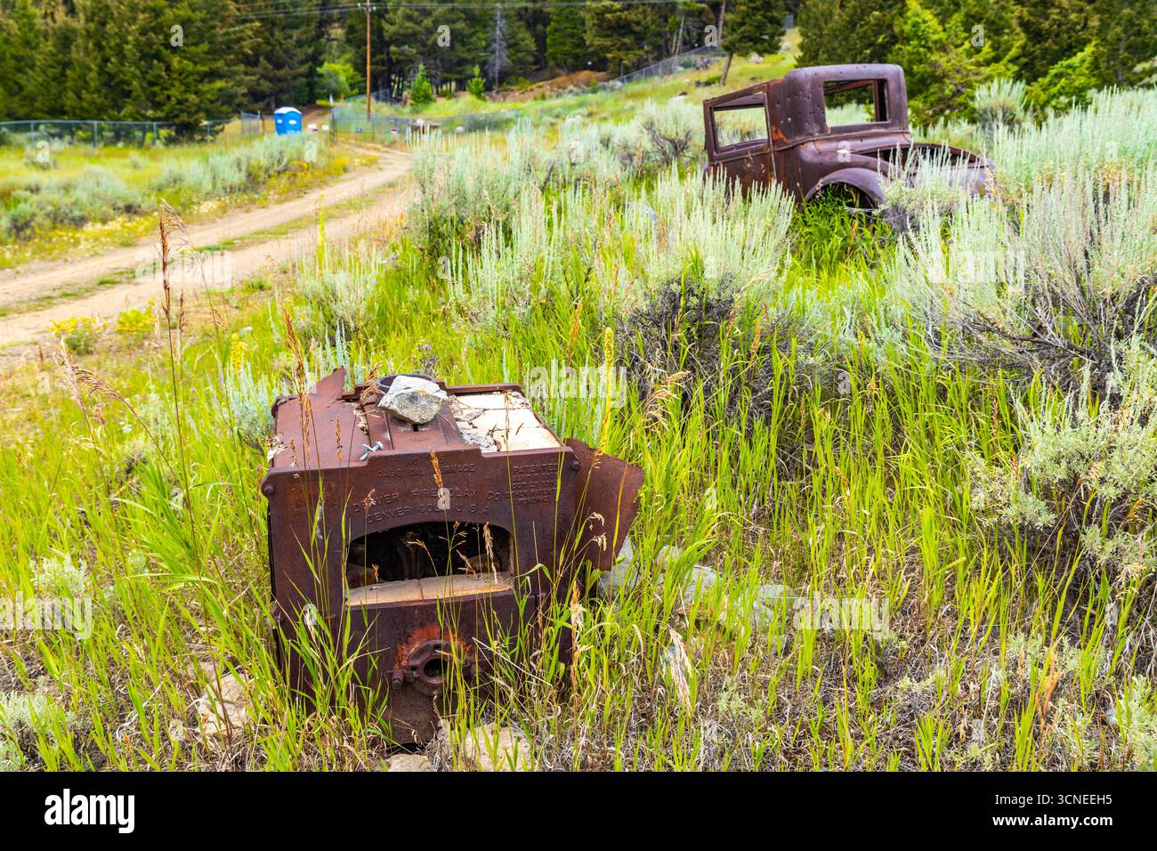 Elkhorn, MT, USA - August 04, 2025: A rusty vintage car, marked with ...