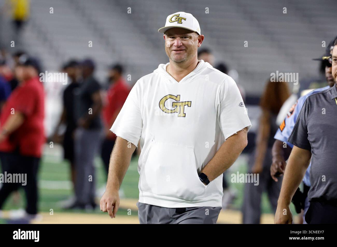 Georgia Tech head coach Brent Key smiles as he walks off the field ...
