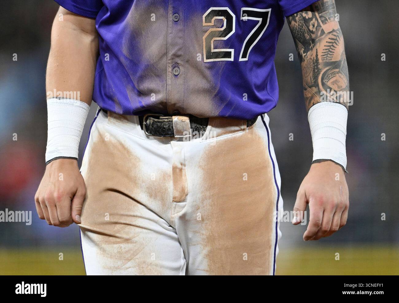 Colorado Rockies outfielder Jordan Beck is covered in dirt during the ...
