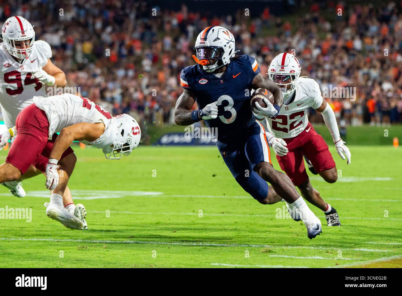 Virginia running back J'Mari Taylor (3) evades Stanford defenders Che ...