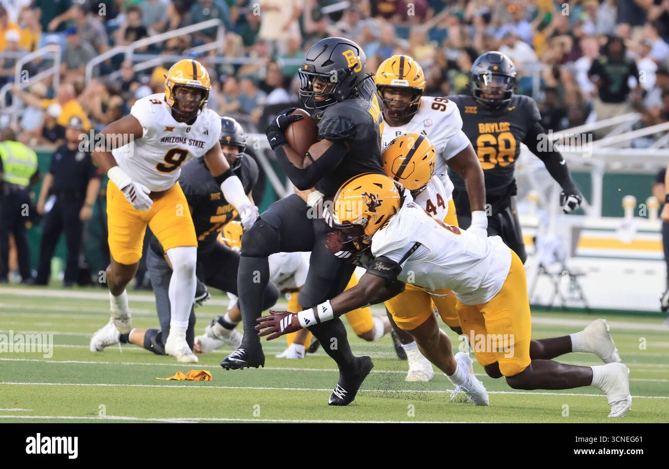 Baylor running back Bryson Washington (7) is tackled by Arizona State ...