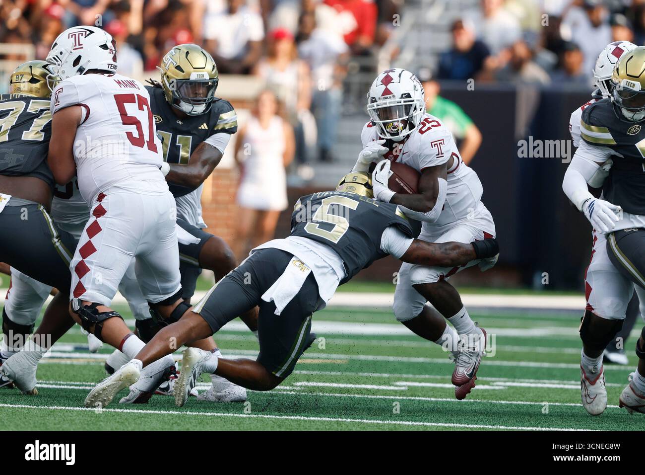 Temple running back Terrez Worthy (25) is tackled by Georgia Tech ...