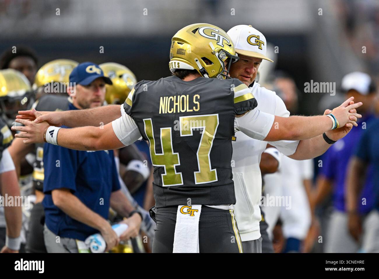 ATLANTA, GA - SEPTEMBER 20: Georgia Tech head coach Brent Key embraces ...