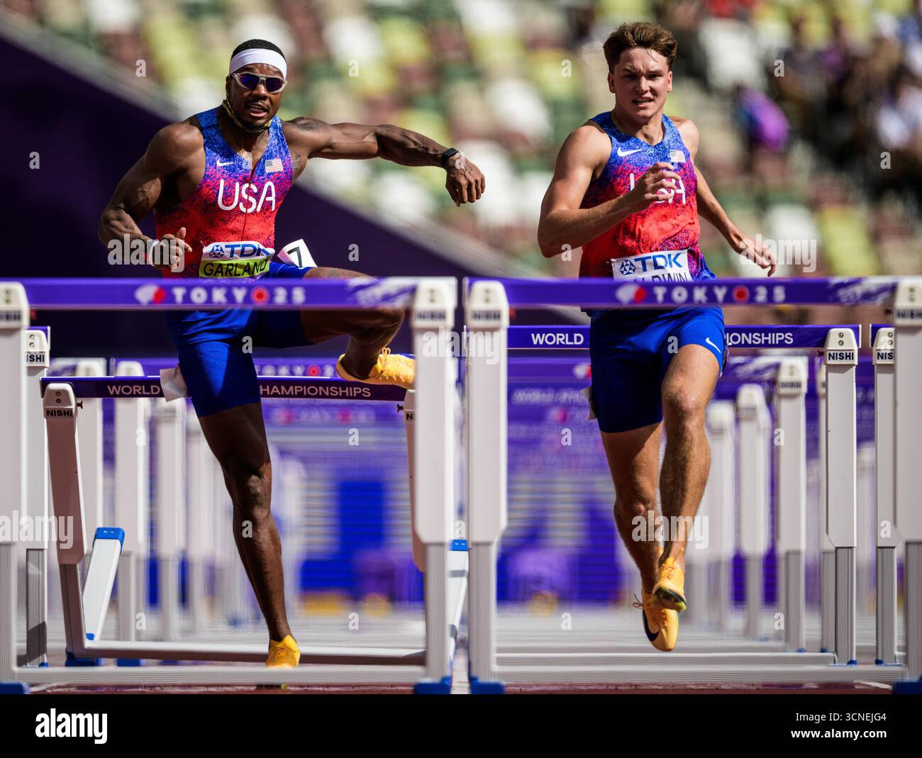 250921 Kyle Garland of USA trips on a hurdle when competing next to ...