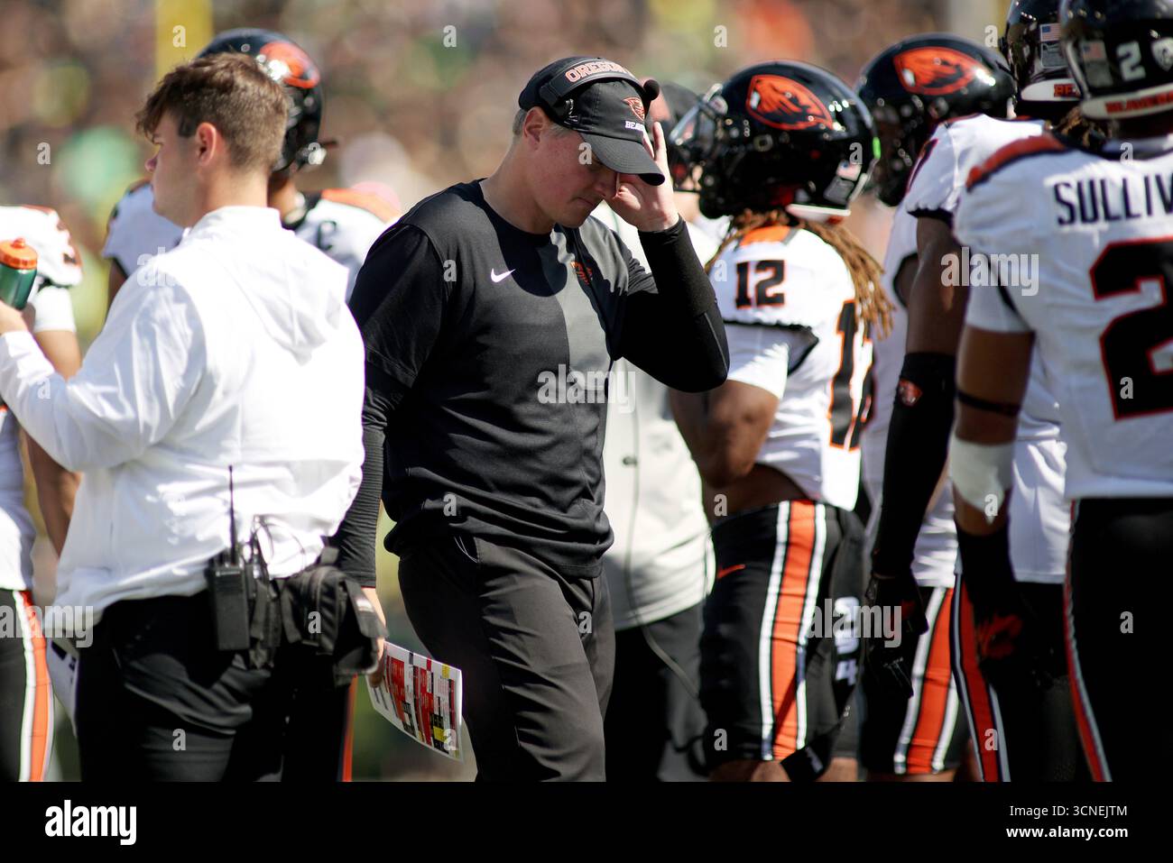 Oregon State head coach Trent Bray walks among his team during the ...