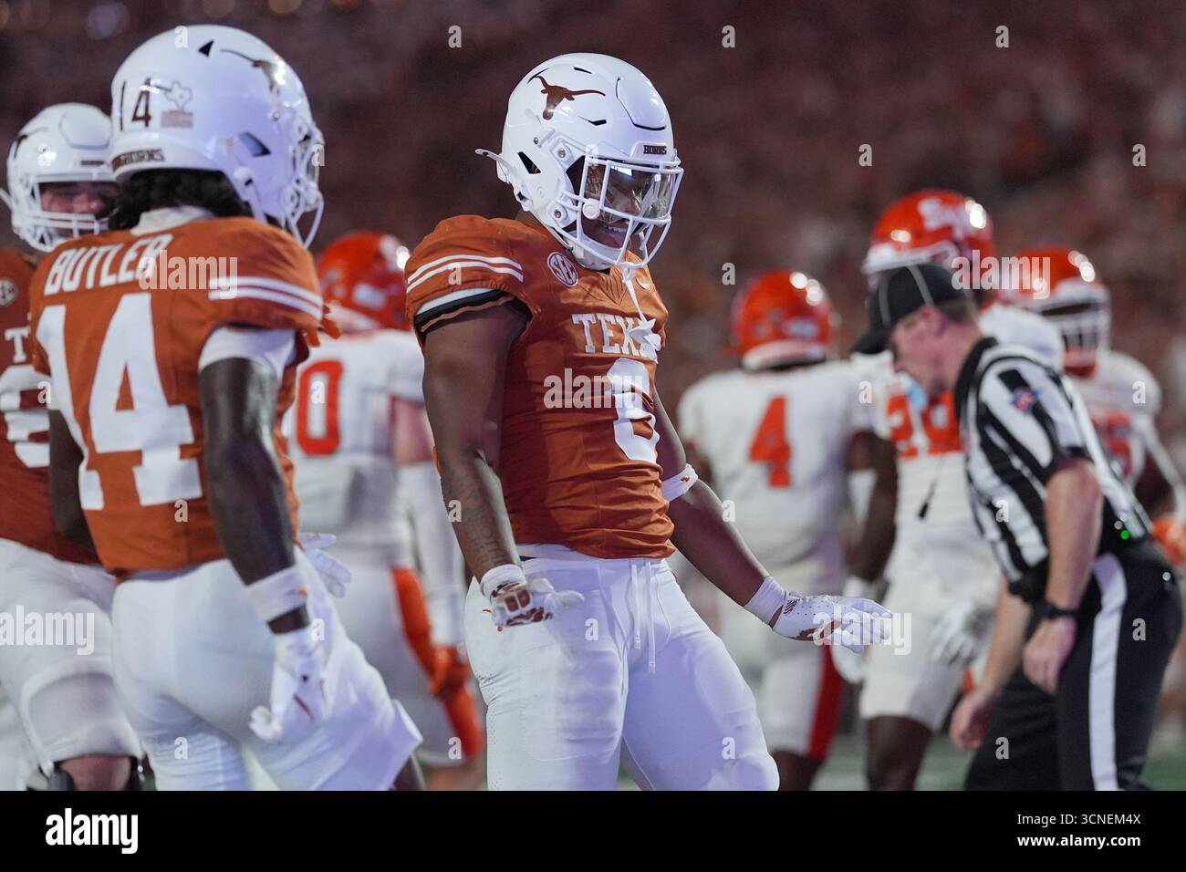 Texas running back Christian Clark (6) celebrates after he scored a ...