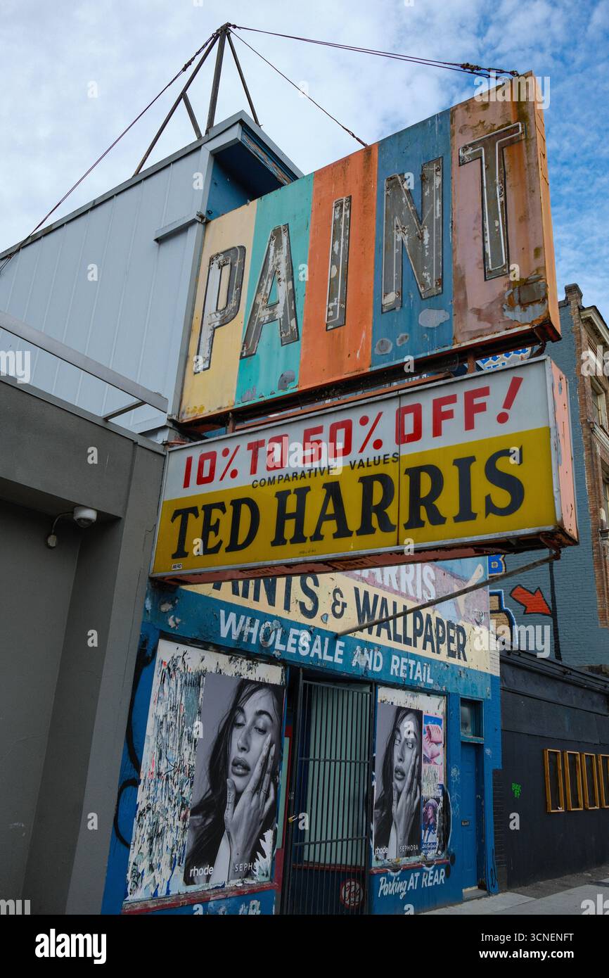 The vintage neon 'Paint' sign on the Ted Harris Paints & Wallpaper ...