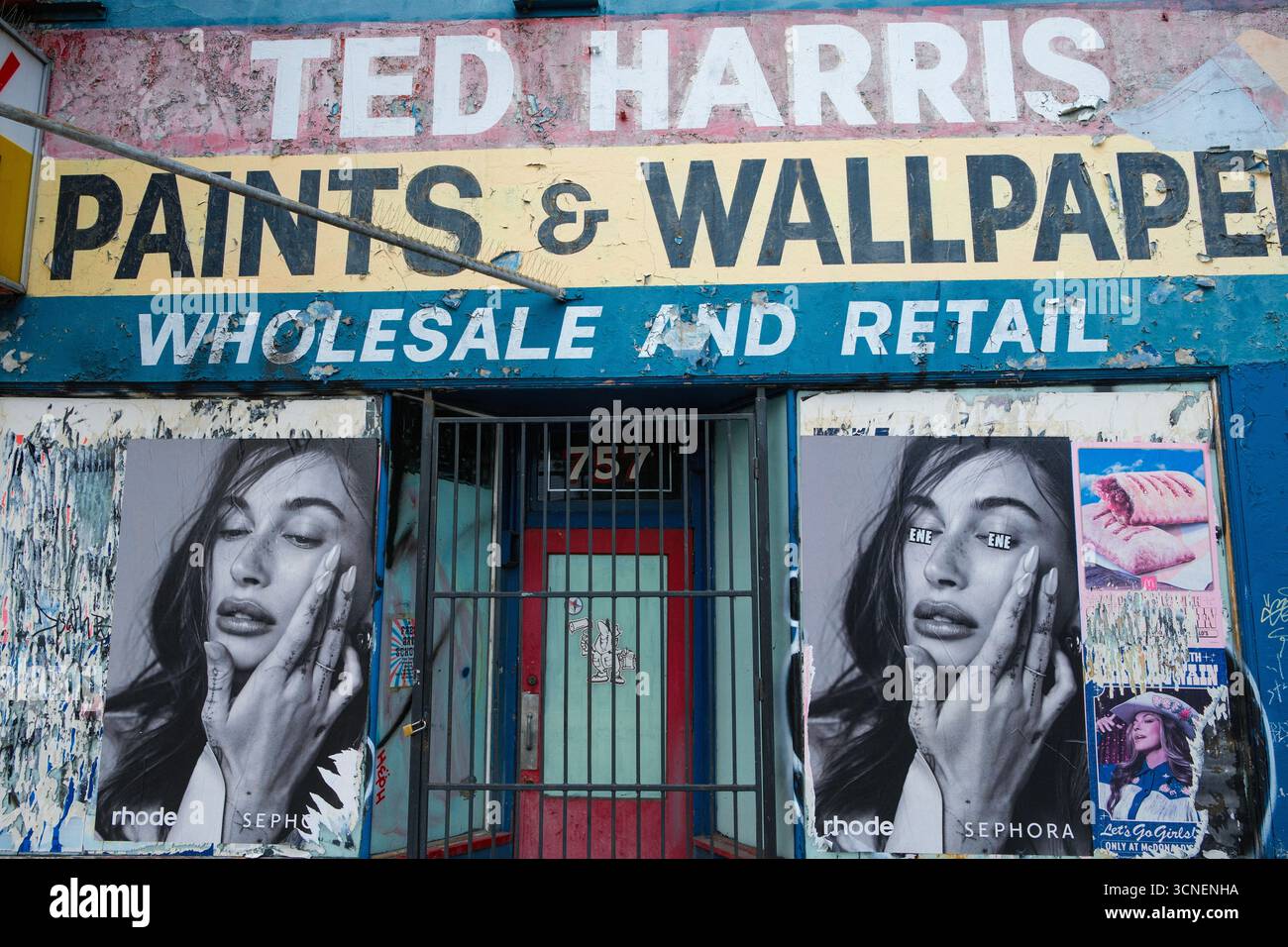 The weathered storefront of Ted Harris Paints & Wallpaper along East ...