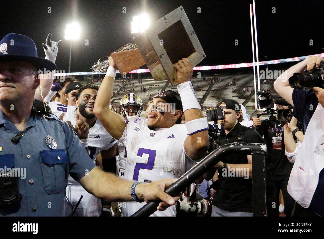 Washington quarterback Demond Williams Jr. (2) celebrates with the ...