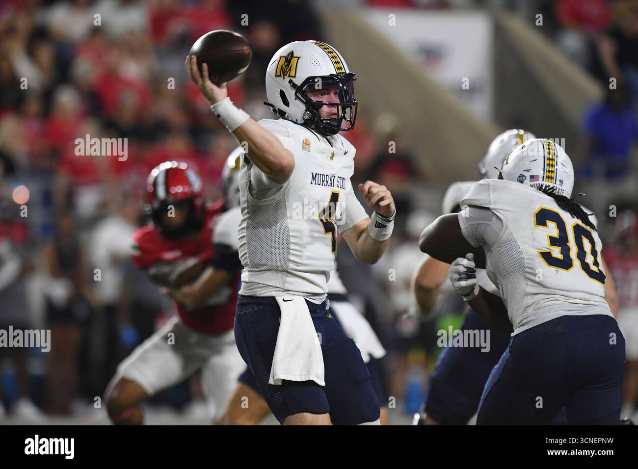 JACKSONVILLE, AL - SEPTEMBER 20: Quarterback Jim Ogle #4 of the Murray ...