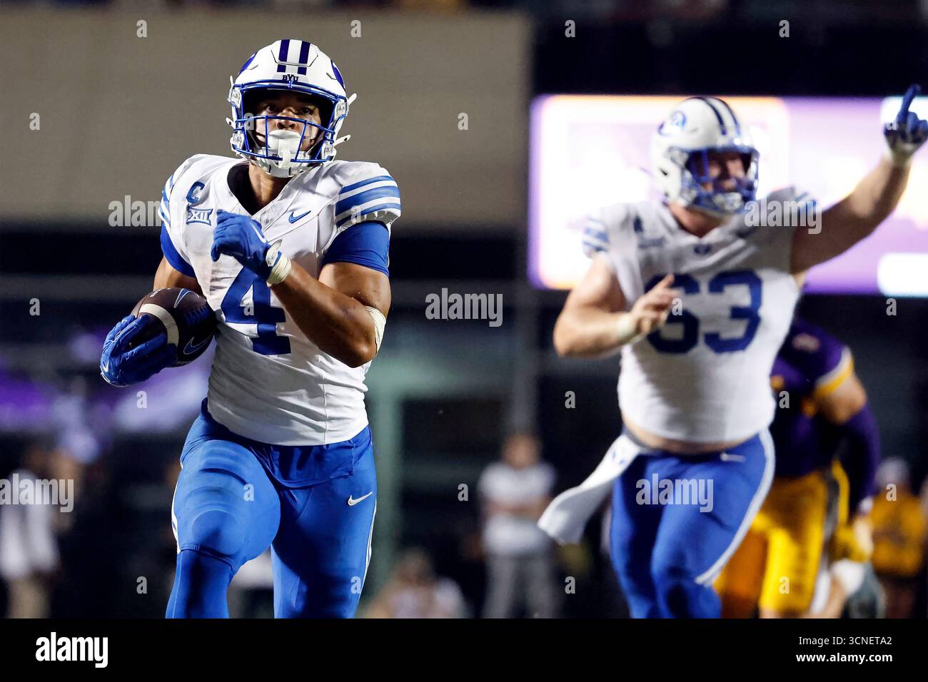 BYU running back LJ Martin (4) runs for a touchdown against East ...