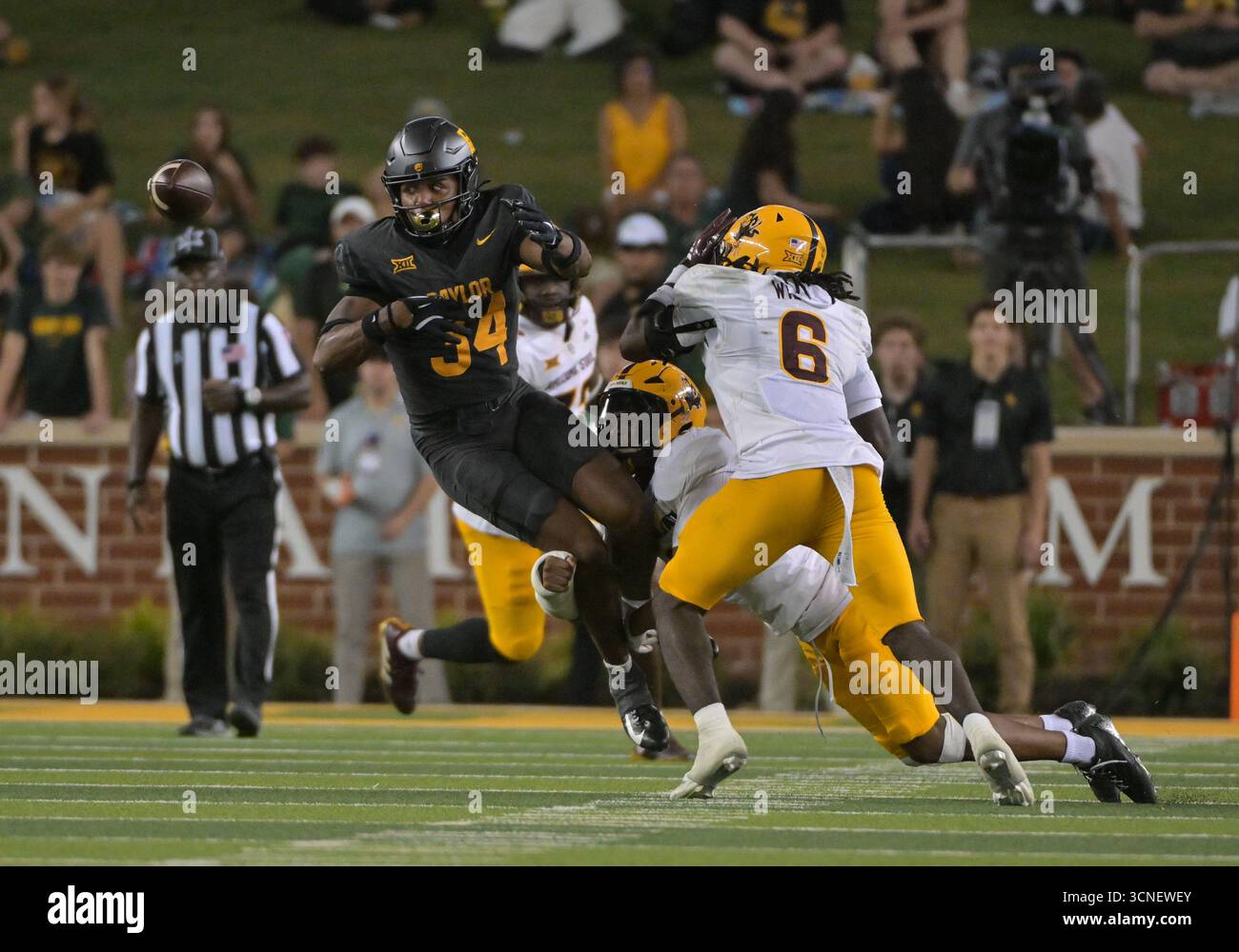 September 20, 2025 Baylor Bears wide receiver Josh Cameron (34) fumbles ...