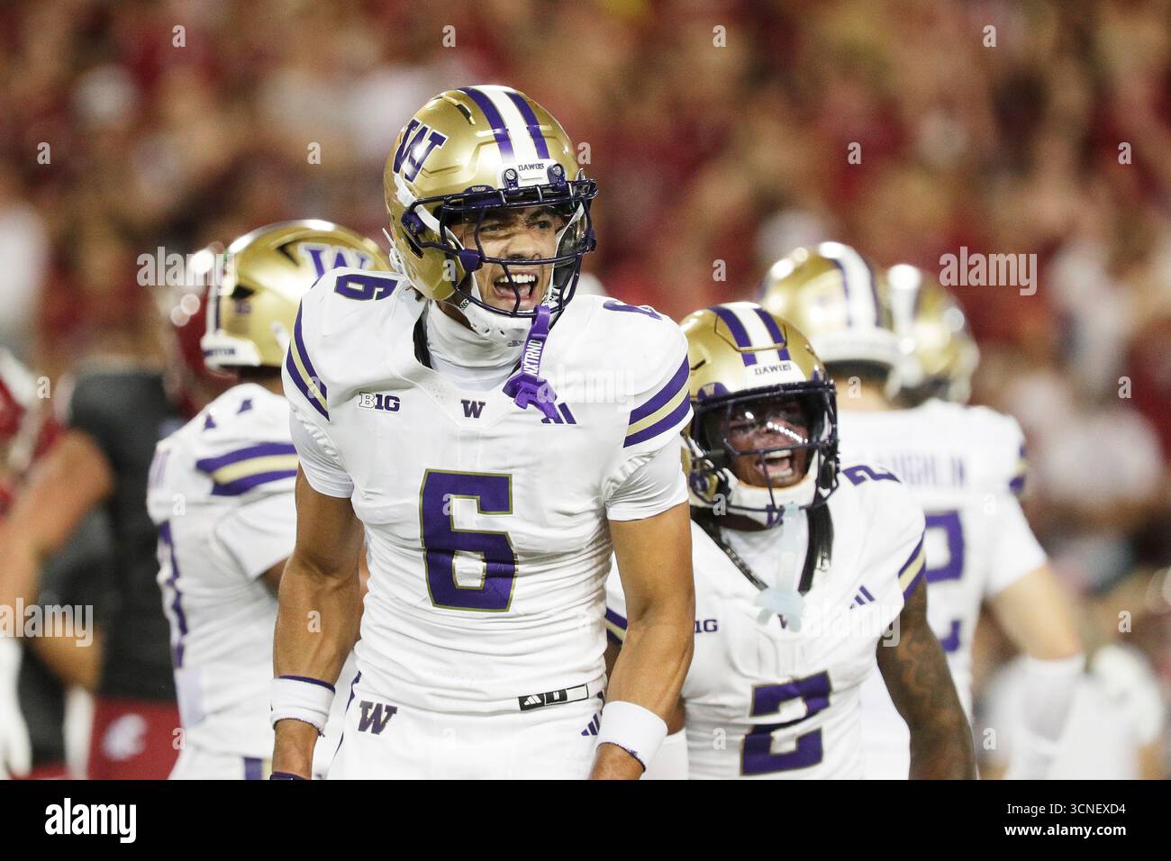 Washington cornerbacks Dylan Robinson (6) and Rahshawn Clark (2 ...