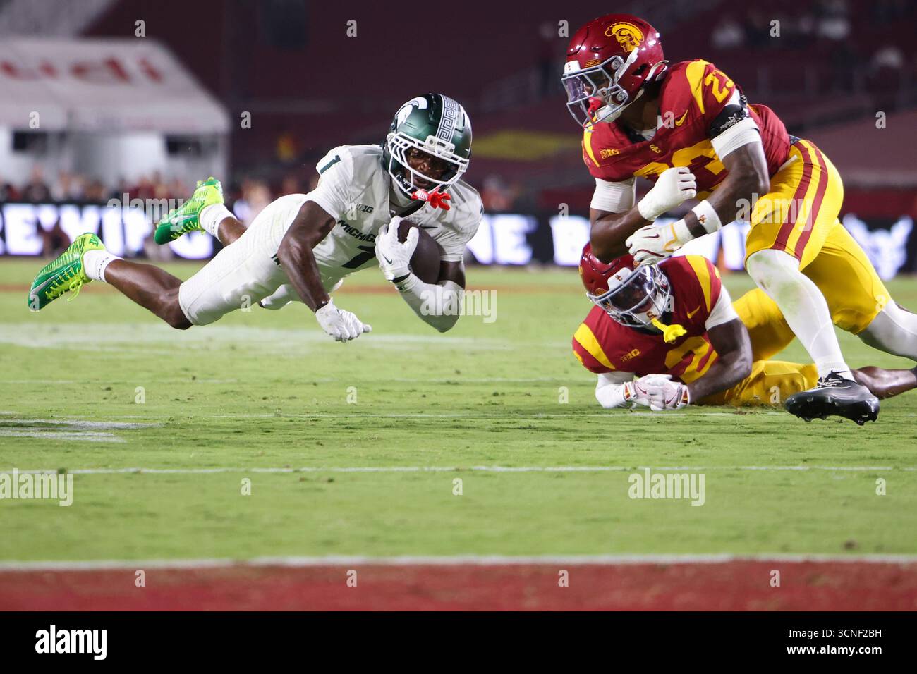 Michigan State wide receiver Omari Kelly leaps with the ball during the ...