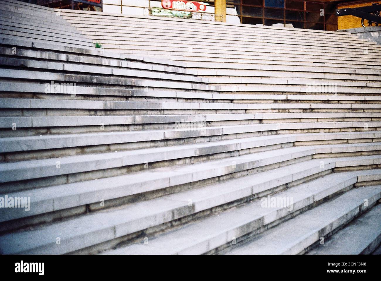 Afternoon analog photo of SPENS concrete staircase in Novi Sad. Harsh ...