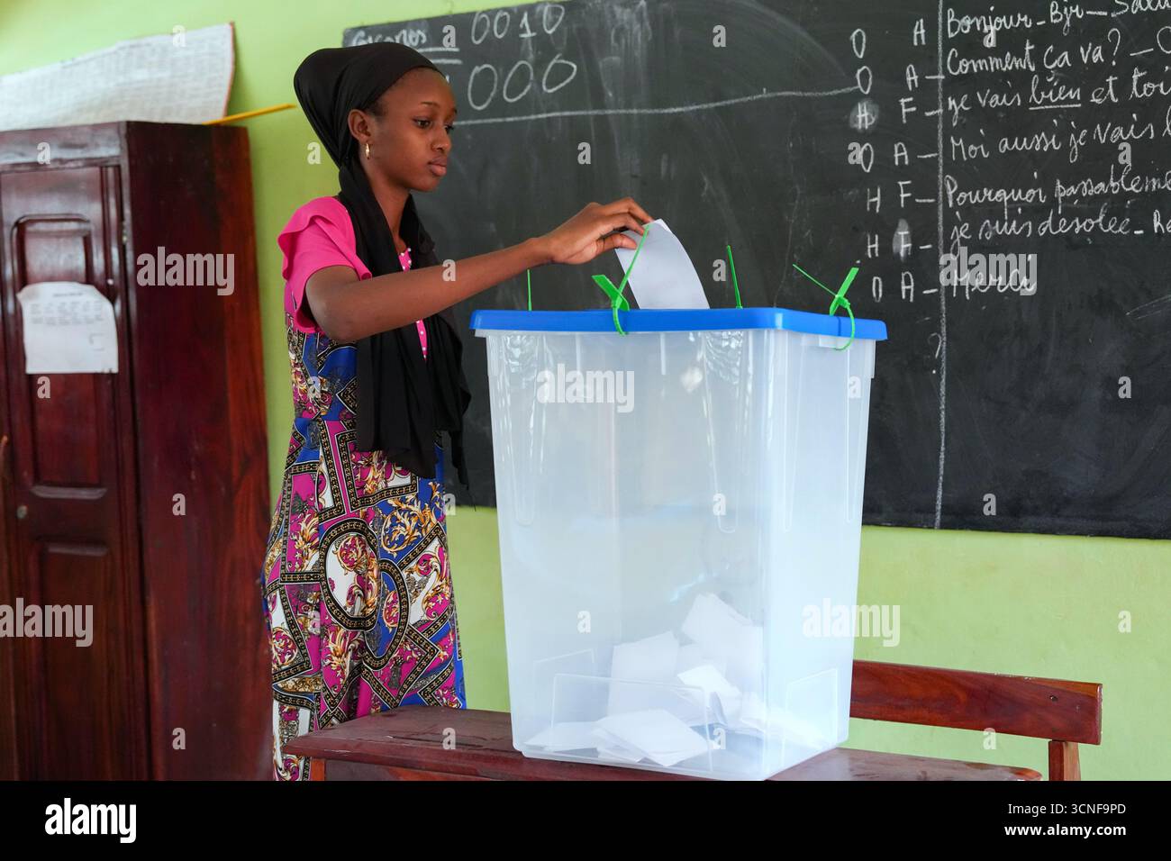 A woman casts her ballot during the constitutional referendum, in ...