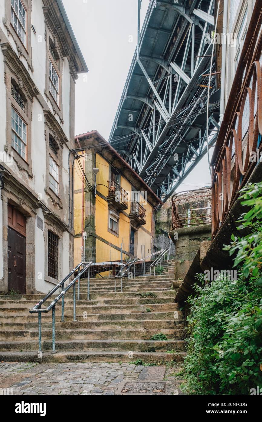 Stone steps wind through Porto historic Ribeira district beneath the ...