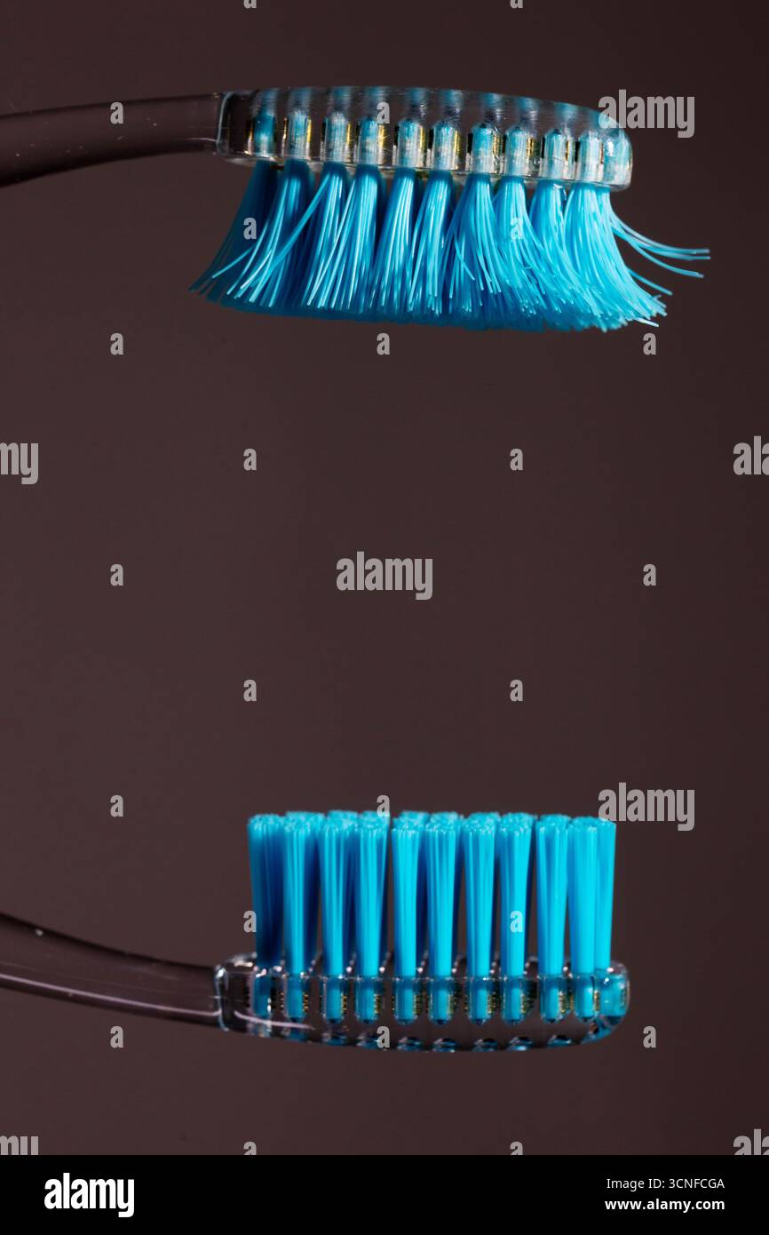 A comparison is made between a new and an old toothbrush. The old ...